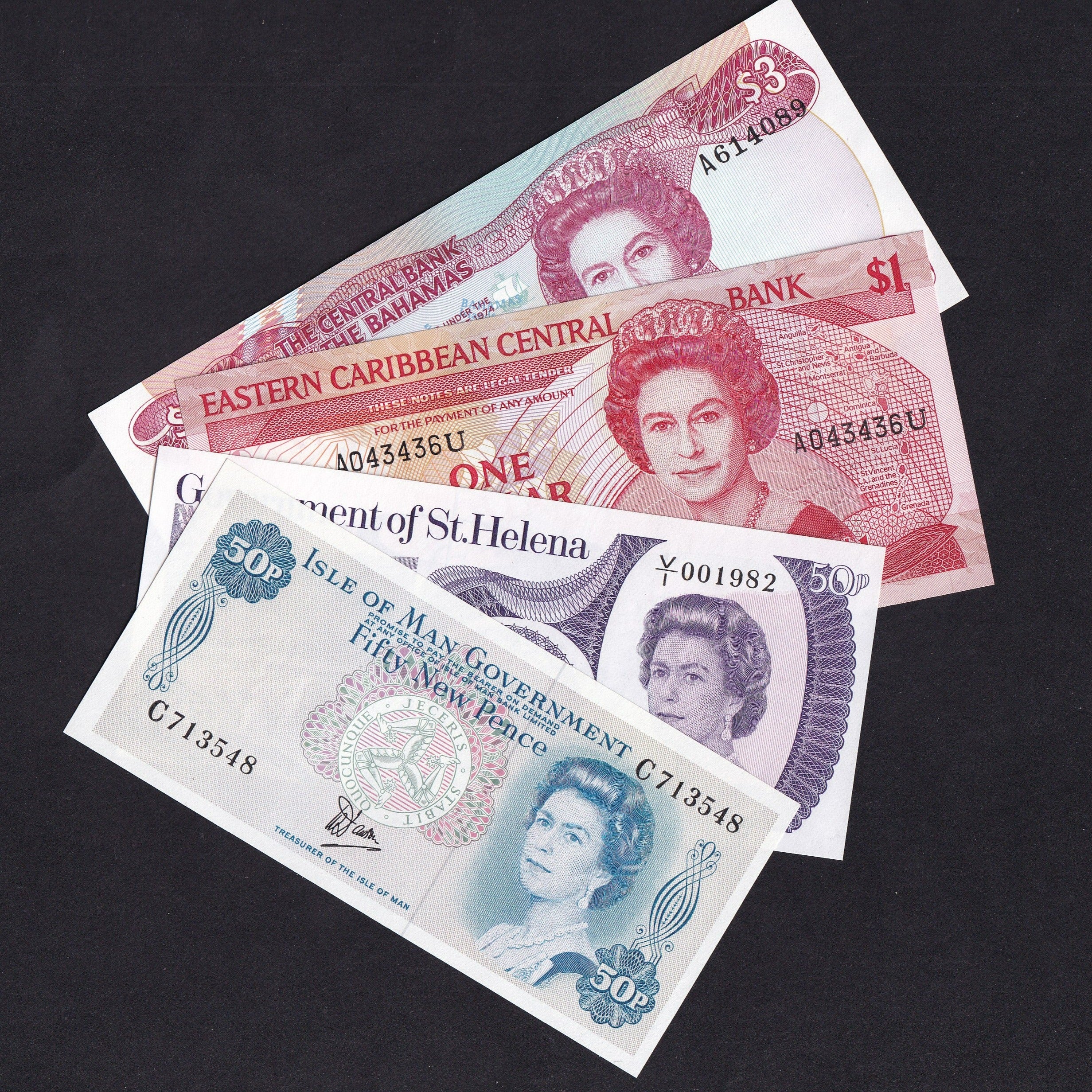 Queen Elizabeth II banknote set, 4 notes: Isle of Man, St. Helena, Eas ...